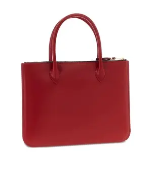 Comme Des Garçons Logo Printed Handbag
