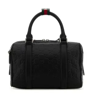 Gucci Monogram Embossed Leather Duffle Bag