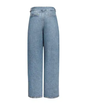 Alaïa Vintage Effect Washed Denim Pleated Pants