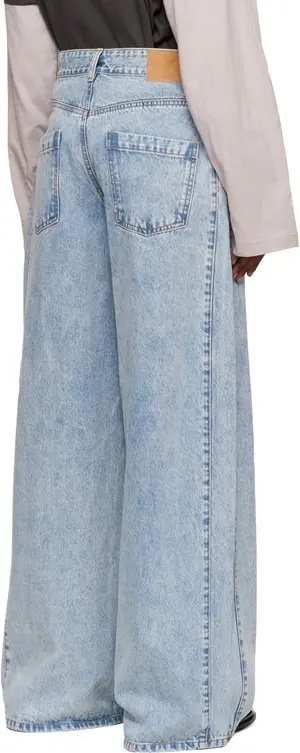 We11Done Low-rise Faded Wide-leg Denim Jeans
