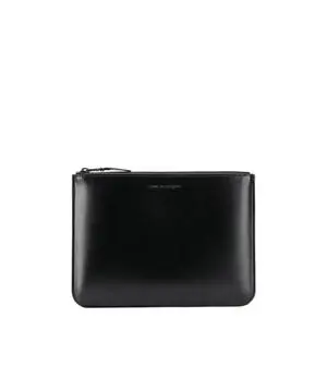 Comme Des Garçons Logo Embossed Zipped Wallet - Black
