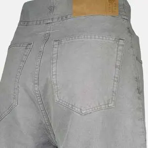 MAISON MARGIELA Logo Patch Straight Leg Jeans