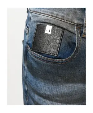 1017 Alyx 9sm Slim-cut Washed Jeans With Logo Decals