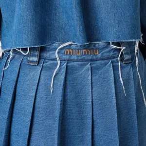 Miu Miu Low-rise Pleated Denim Skirt
