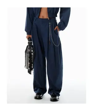 Alexander Wang Mid Rise Pleated Trousers With Detachable Chain Belt - Blue