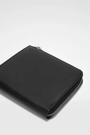 JIL SANDER Logo Embossed Zipped Cardholder - Black