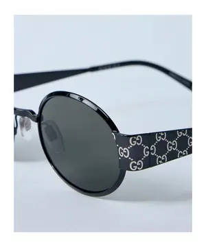 Gucci Oval Frame Sunglasses With Logo Detail