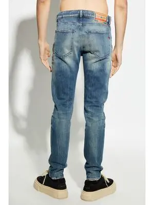 DIESEL® Ripped Straight Leg Jeans