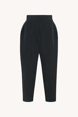 THE ROW Pleated Tapered Leg Silk Trousers