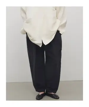 THE ROW Pleated Tapered Leg Silk Trousers