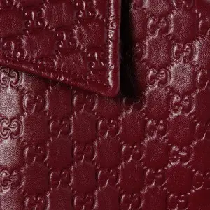 Gucci Embossed Gg Leather Jacket - Red