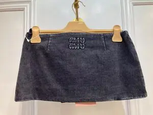 Miu Miu Wrapped Mini Skirt With Logo Detail - Black