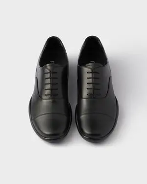 Prada Round Toe Lace-up Sneakers