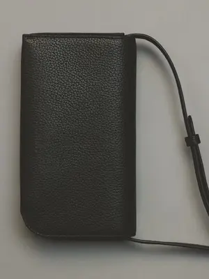 Jacquemus The Curvo Flap Crossbody Bag
