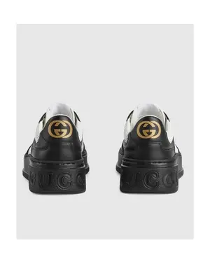 Gucci Gg Embossed Low-top Sneakers With Buckle Detail - Black