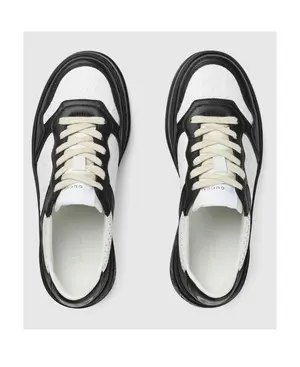 Gucci Gg Embossed Low-top Sneakers With Buckle Detail - Black