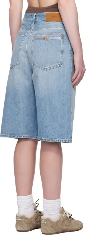 Amiri Light Wash Distressed Denim Shorts