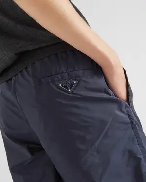 Prada Triangle Logo Plaque Elastic Swim Shorts - Blue