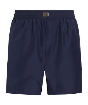 Dolce & Gabbana Elastic Waist Swim Shorts With Logo Plaque - Blue