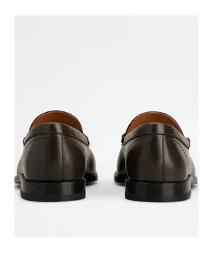 TOD'S Round-toe Calfskin Penny Loafers With Signature Embossing And Hand-stitching - Brown
