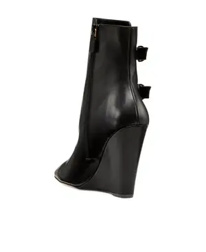 STUART WEITZMAN Pointed Toe Wedge Boots