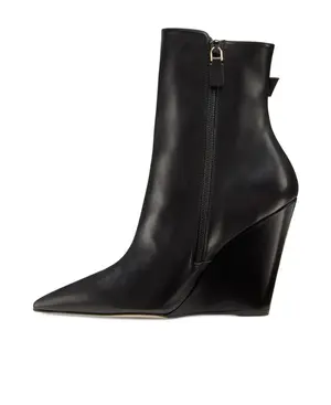 STUART WEITZMAN Pointed Toe Wedge Boots