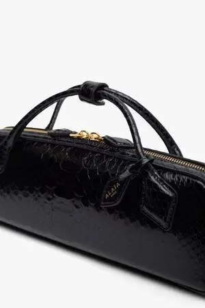 Alaïa Textured Top Handle Clutch Bag - Black