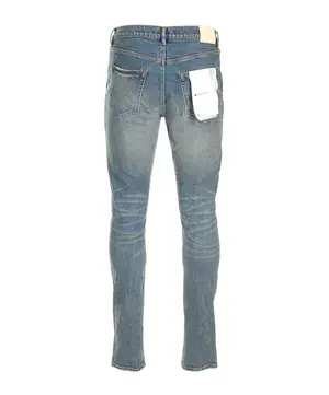 PURPLE BRAND Slim Tapered Jeans With Distressed Details