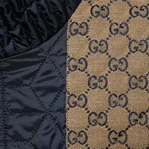 Gucci Quilted Gg-detail Zip-up Jacket - Black