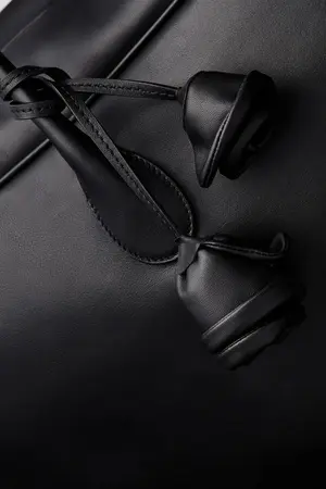 Magda Butrym Brigitte Leather Travel Bag With Flower Charm - Black