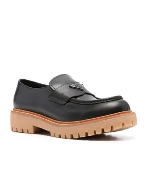 Prada Logo Plaque Round Toe Loafers