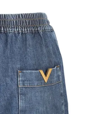 Valentino Garavani Logo Plaque Wide Leg Jeans - Blue