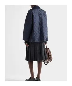 Prada Re-nylon Quilted Jacket With Enamel Triangle Logo - Blue