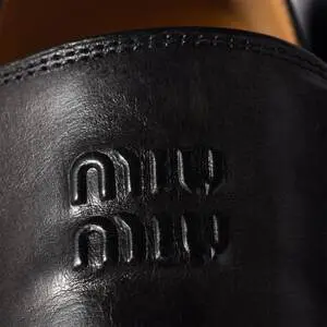 Miu Miu Logo-embossed Leather Mocassins - Black