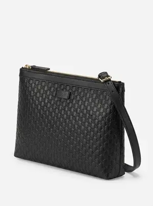 Gucci Embossed Logo Shoulder Bag