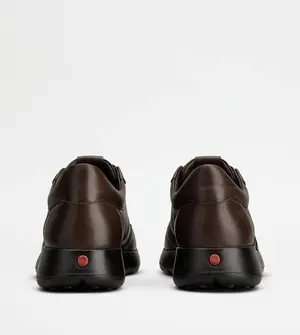 TOD'S Leather Lace-up Sneakers With Rubber Pebble Detail
