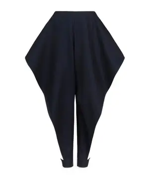 Alaïa Mid-rise Tapered Trousers With Ruffled Edges