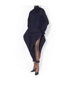 Alaïa Mid-rise Tapered Trousers With Ruffled Edges