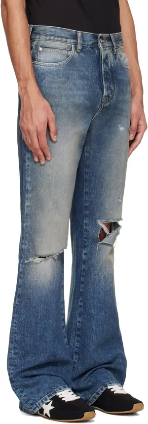 Amiri Ripped Knee Bootcut Denim Jeans
