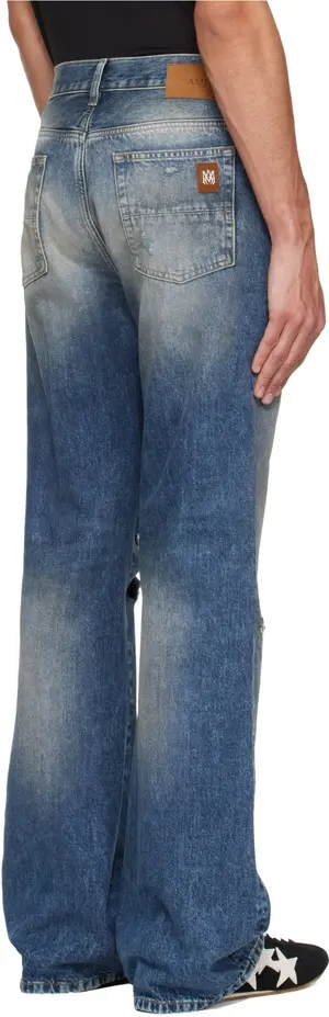 Amiri Ripped Knee Bootcut Denim Jeans