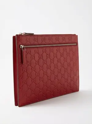 Gucci Monogrammed Leather Clutch - Red