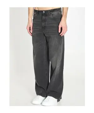 Dolce & Gabbana Wide Leg Jeans With Logo Plaque