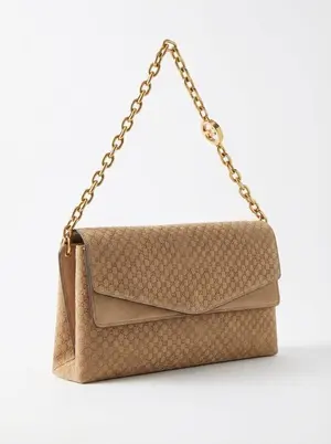 Gucci Monogrammed Clutch With Chain And Leather Straps