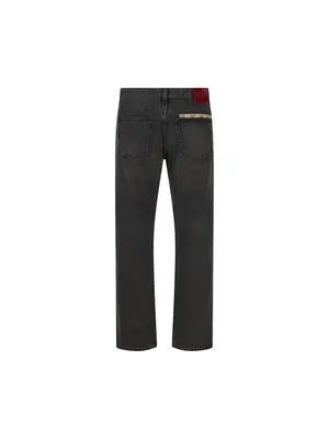 Gucci Washed Denim Jeans With Monogram Detail