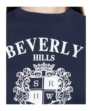 SPORTY  RICH Sporty & Rich Long Sleeve Sweatshirt With Graphic Detail