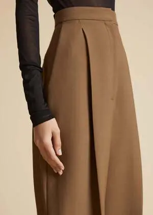Khaite High-waisted Pleated Ankle-length Trousers - Brown