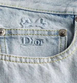 Dior Flared Jeans With Silver-finish Cd Signature