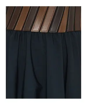 Alaïa Leather Trimmed Midi Skirt