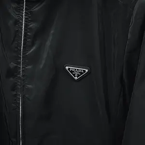Prada Long Sleeve Zip-up Jacket With Logo Detail