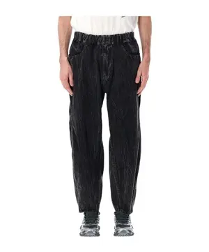 AND WANDER Textured Relaxed-fit Pants